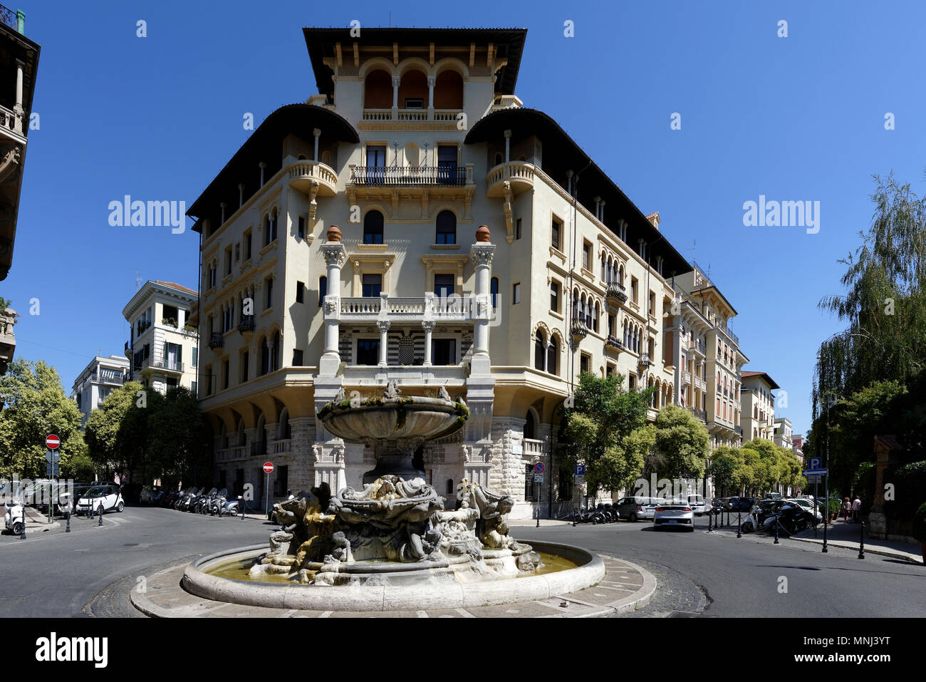 Piazza Mincio, with the Fontana delle Rane and a building with an ...
