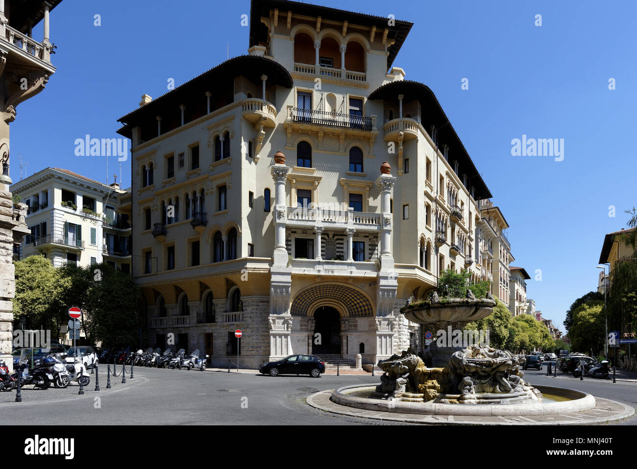 Piazza Mincio, with the Fontana delle Rane and a building with an ...