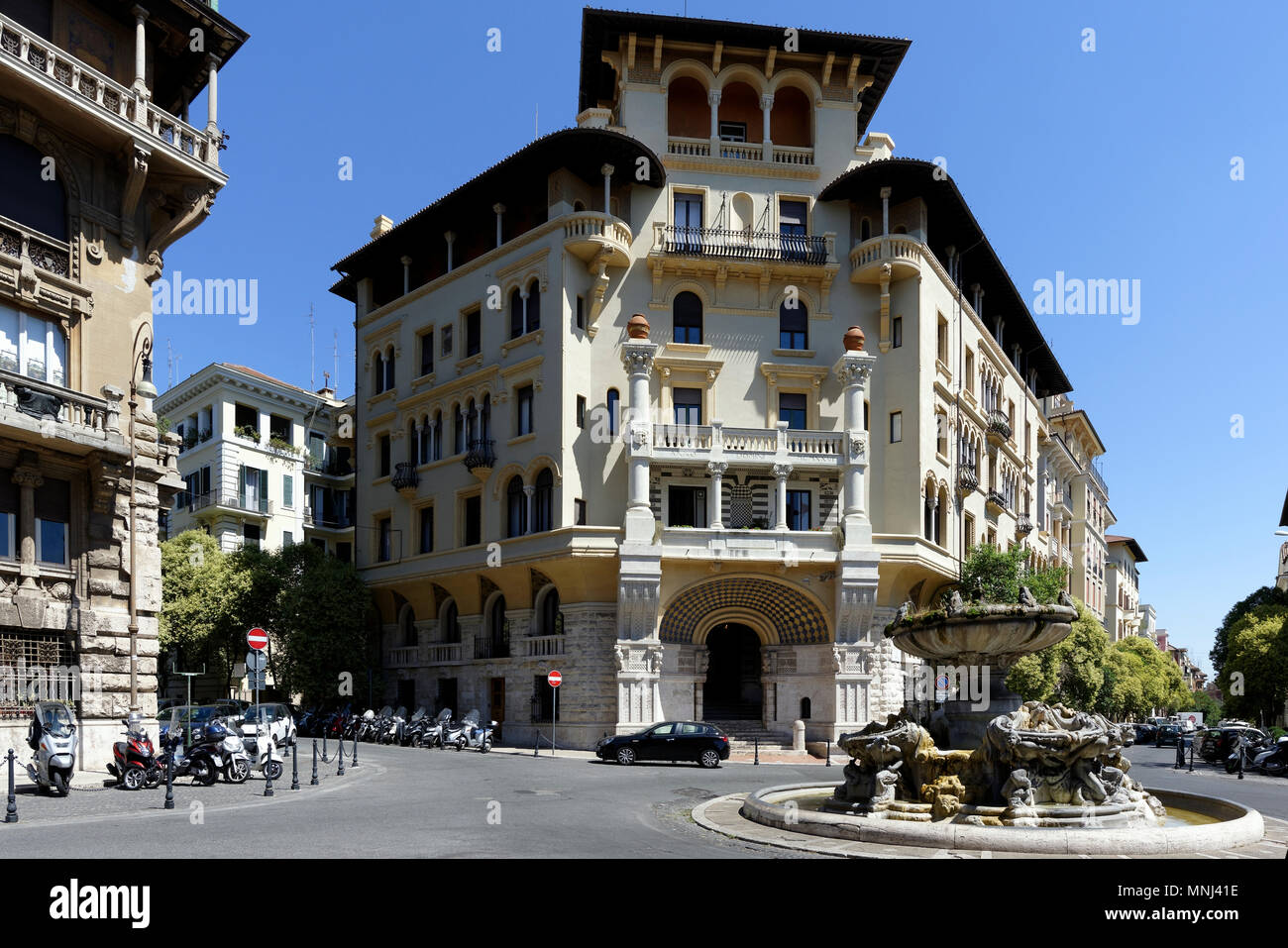 Piazza Mincio, with the Fontana delle Rane and a building with an ...