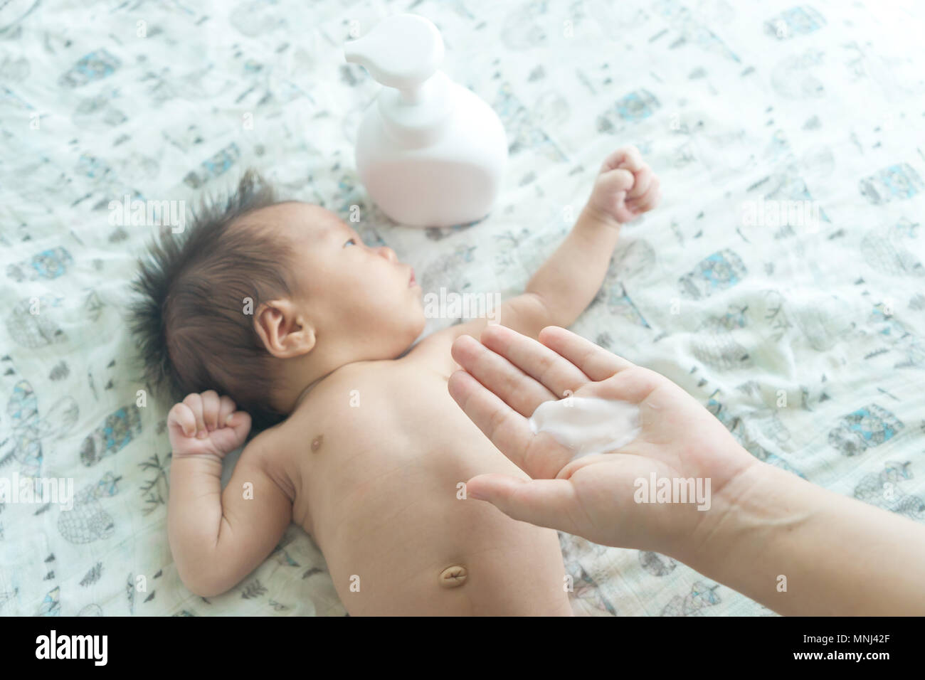 Baby body lotion hi-res stock photography and images - Alamy