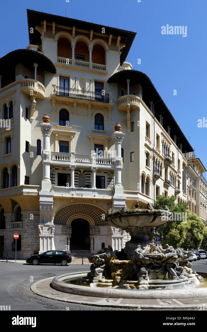 Piazza Mincio, with the Fontana delle Rane and a building with an ...
