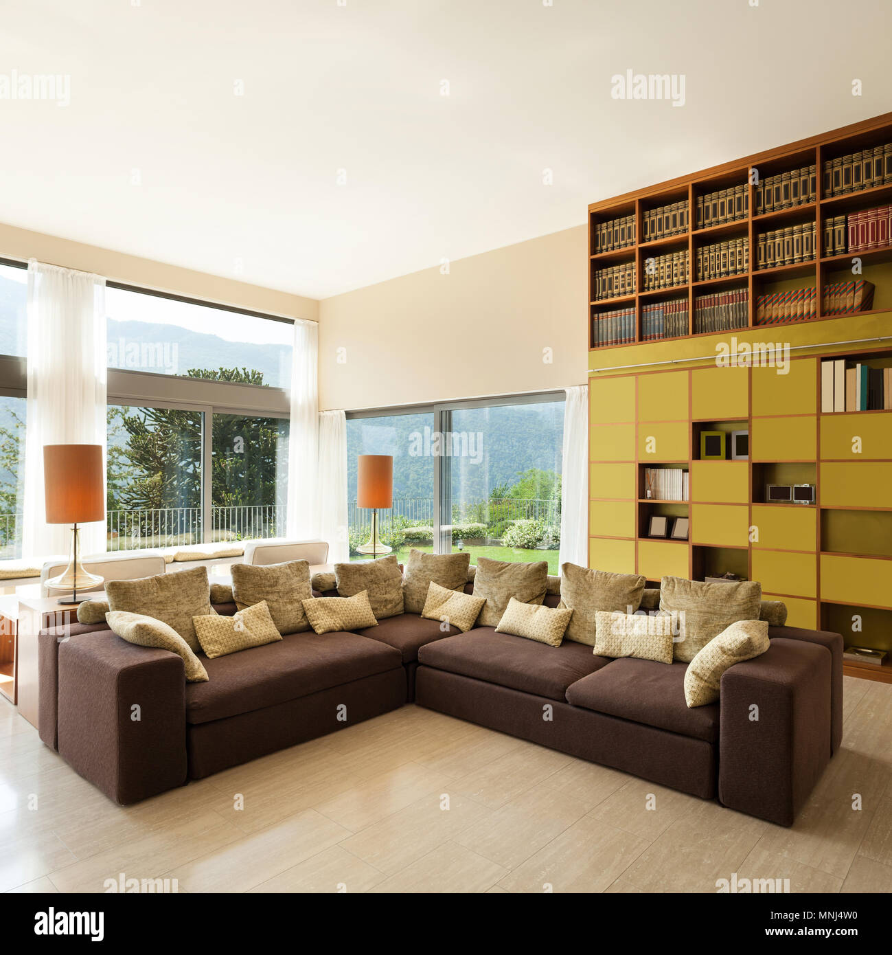 Interior of a modern living room, comfortable divan Stock Photo - Alamy