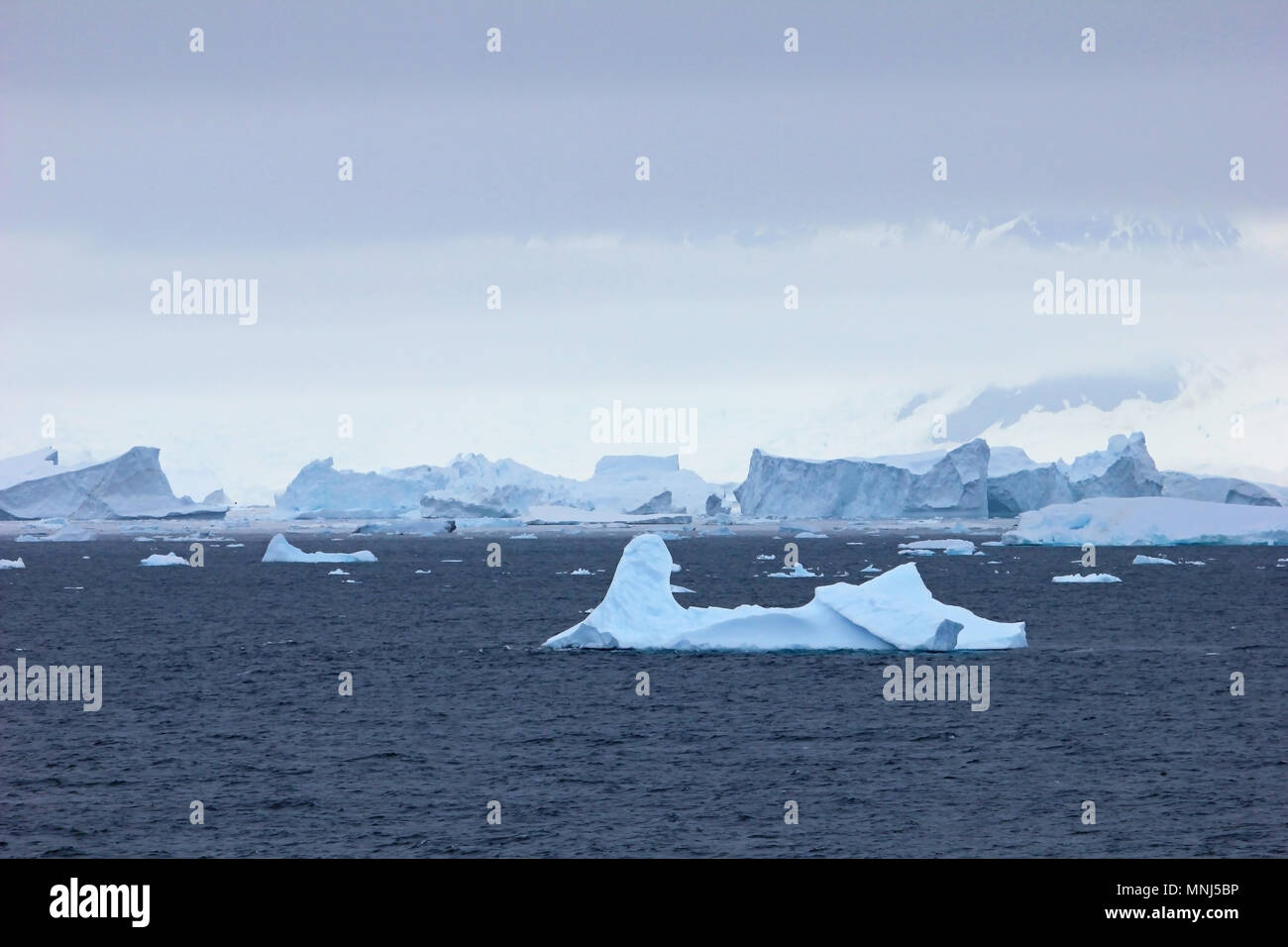 Antarctic landscape, icebergs, mountains and ocean, Antarctic Peninsula ...