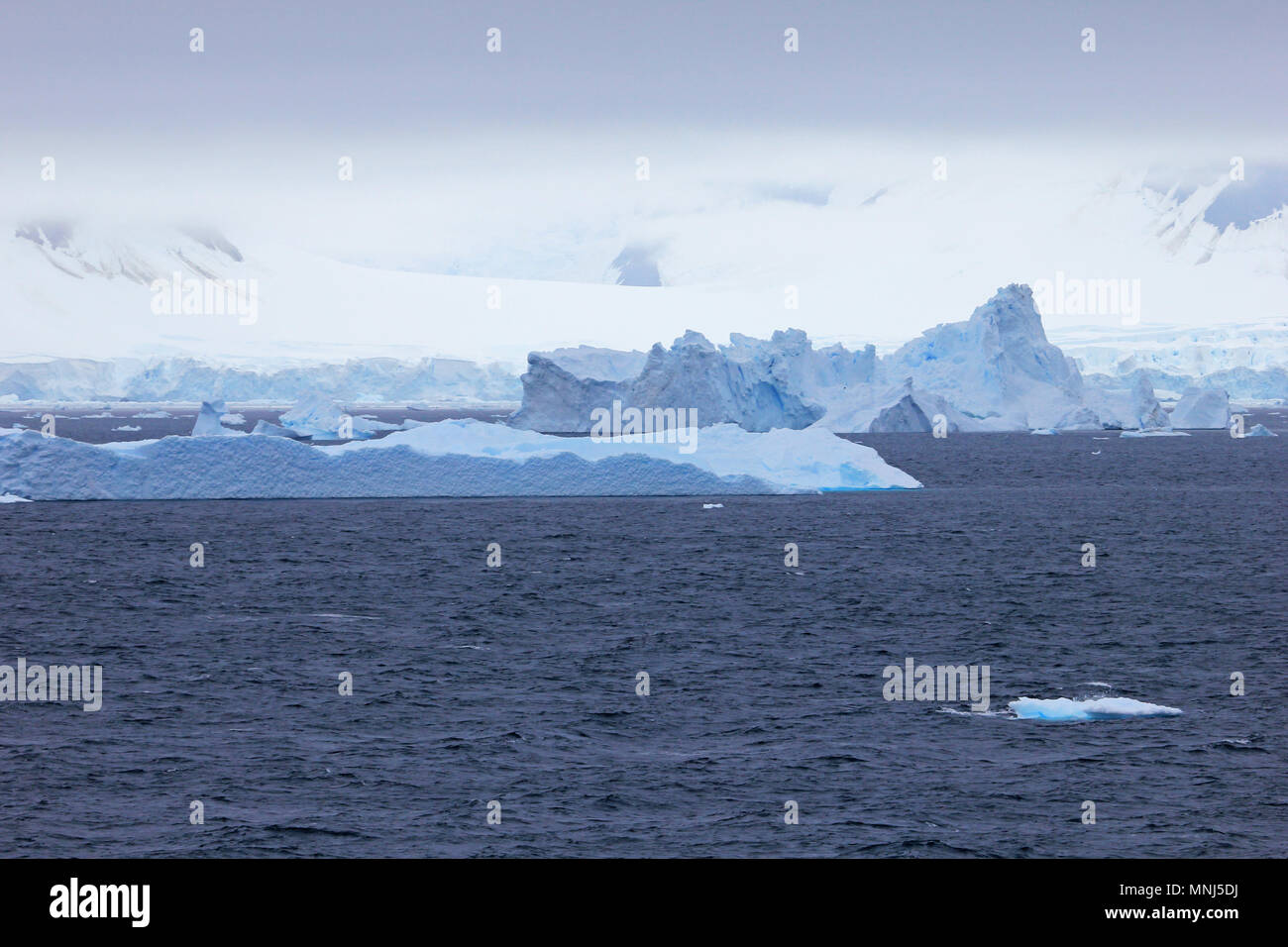 Antarctic landscape, icebergs, mountains and ocean, Antarctic Peninsula ...