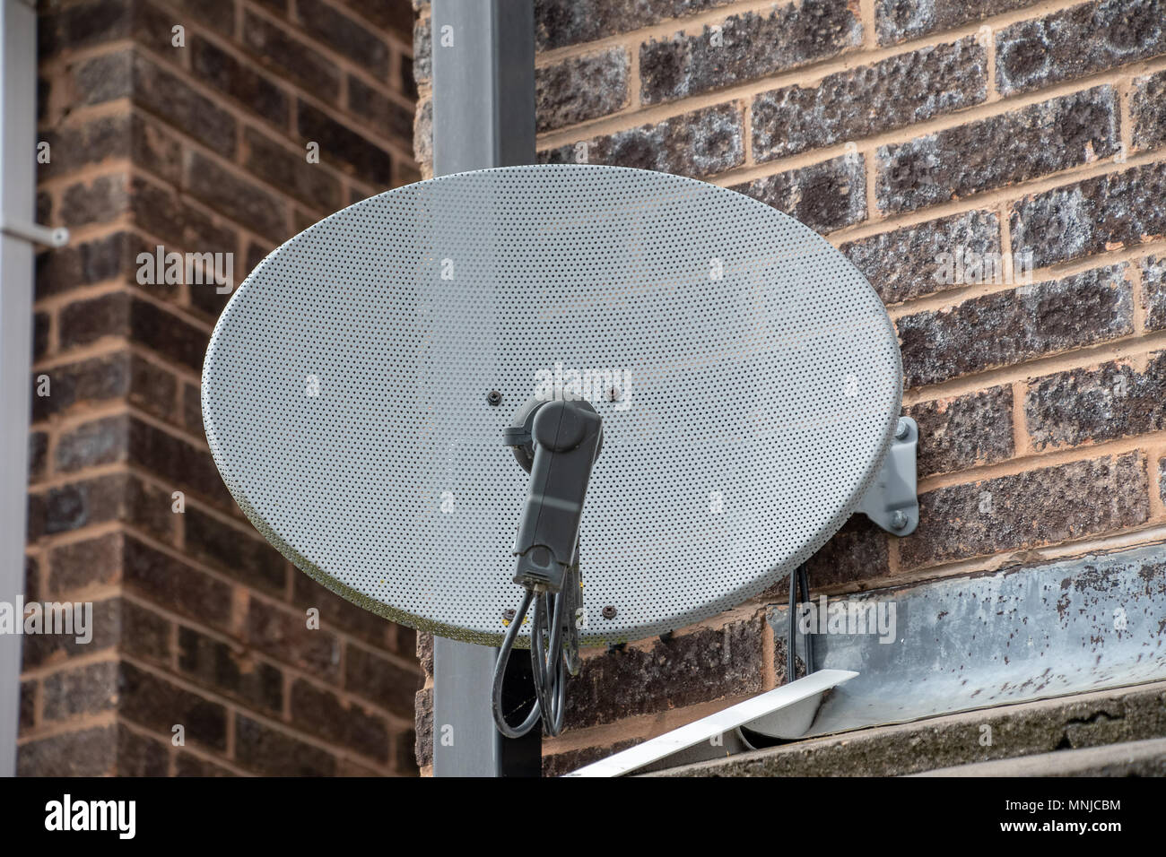 Wall mounted satellite dish hi-res stock photography and images - Alamy