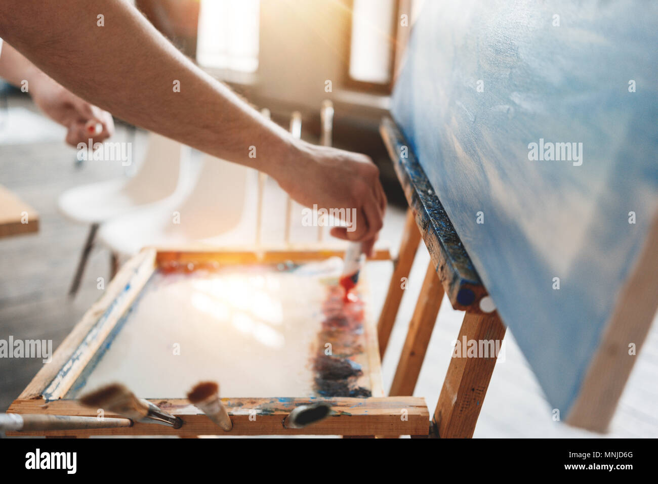 Squeezing a tube hi-res stock photography and images - Alamy