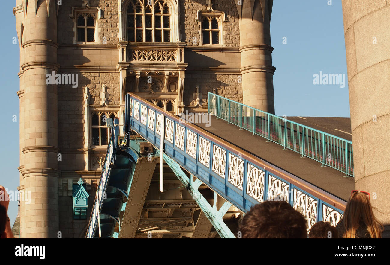 A view of the raised road of Tower Bridge, London from the pavement on ...