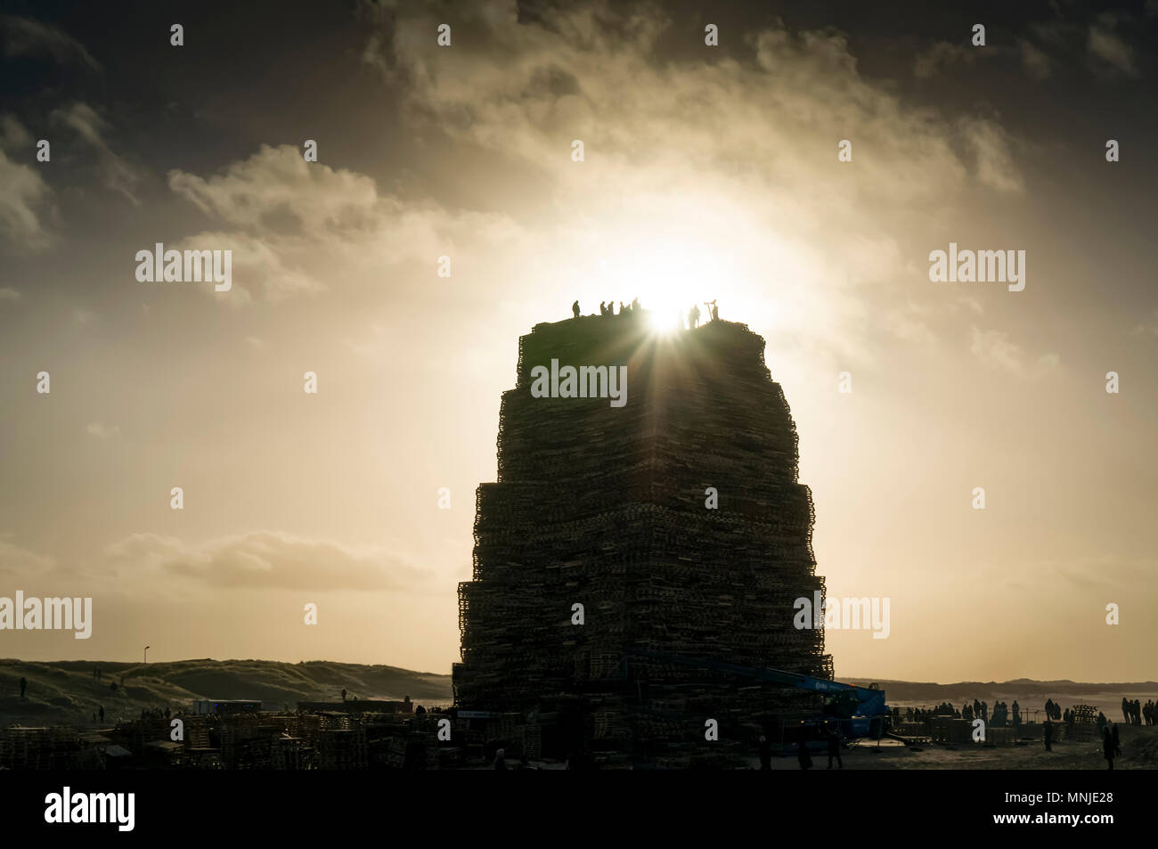 Building huge bonfire Stock Photo - Alamy