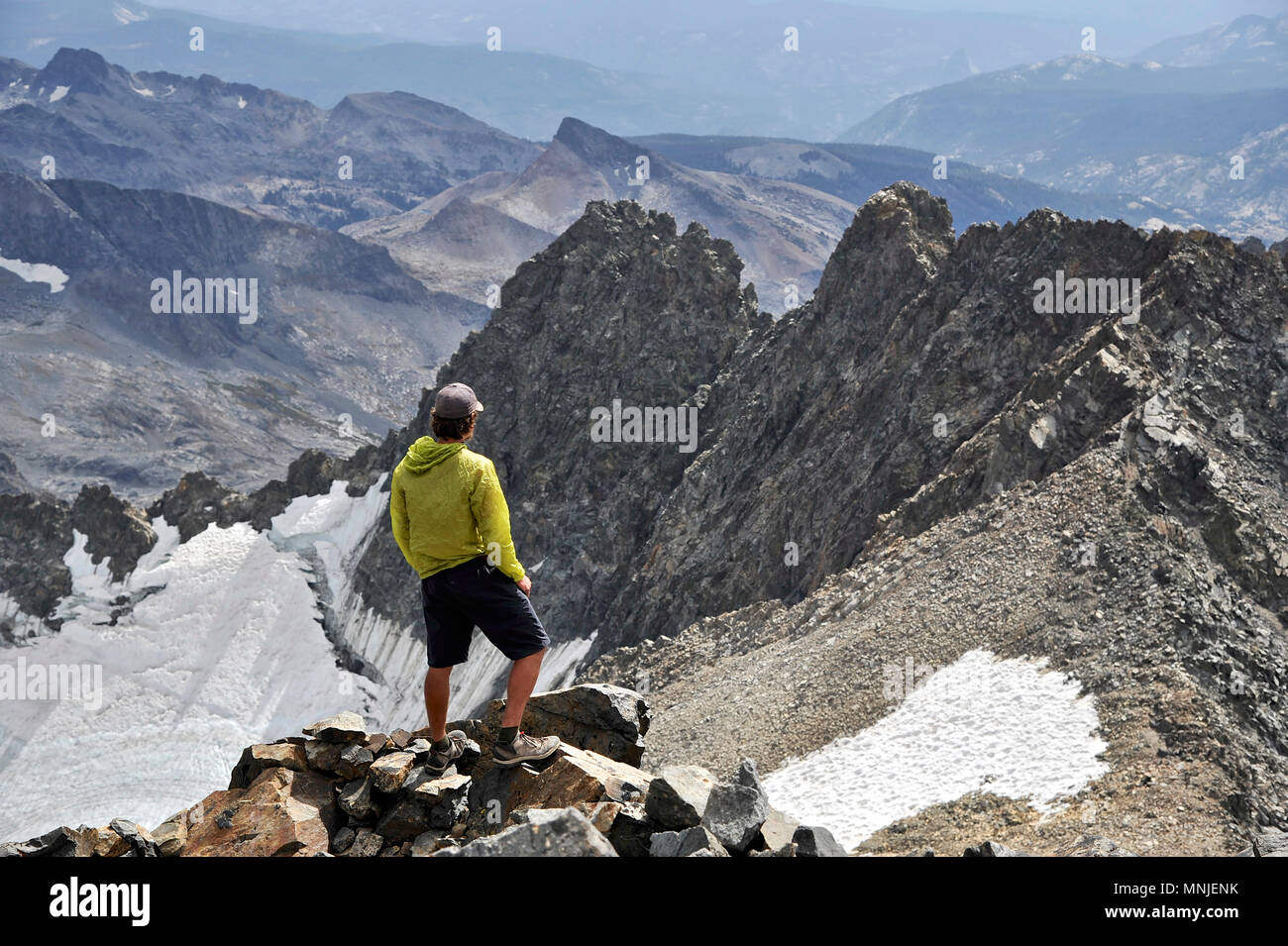 Backpackers climbing Mt Ritter on trek of Sierra High Route in Minarets ...