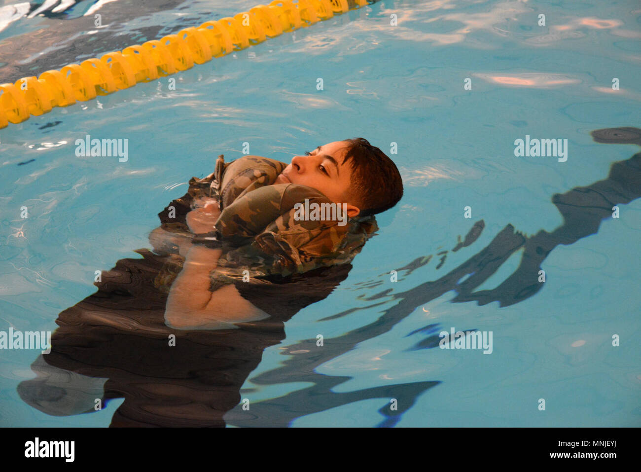 U.S. Army Spc. Jacqueline Delgado, assigned to U.S. Army Garrison ...