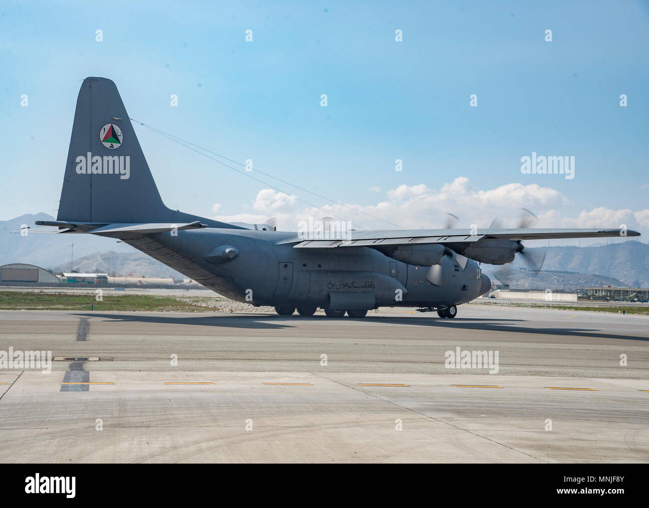 An Afghan Air Force C-130 taxis to the runway March 3, 2018, Kabul Air ...