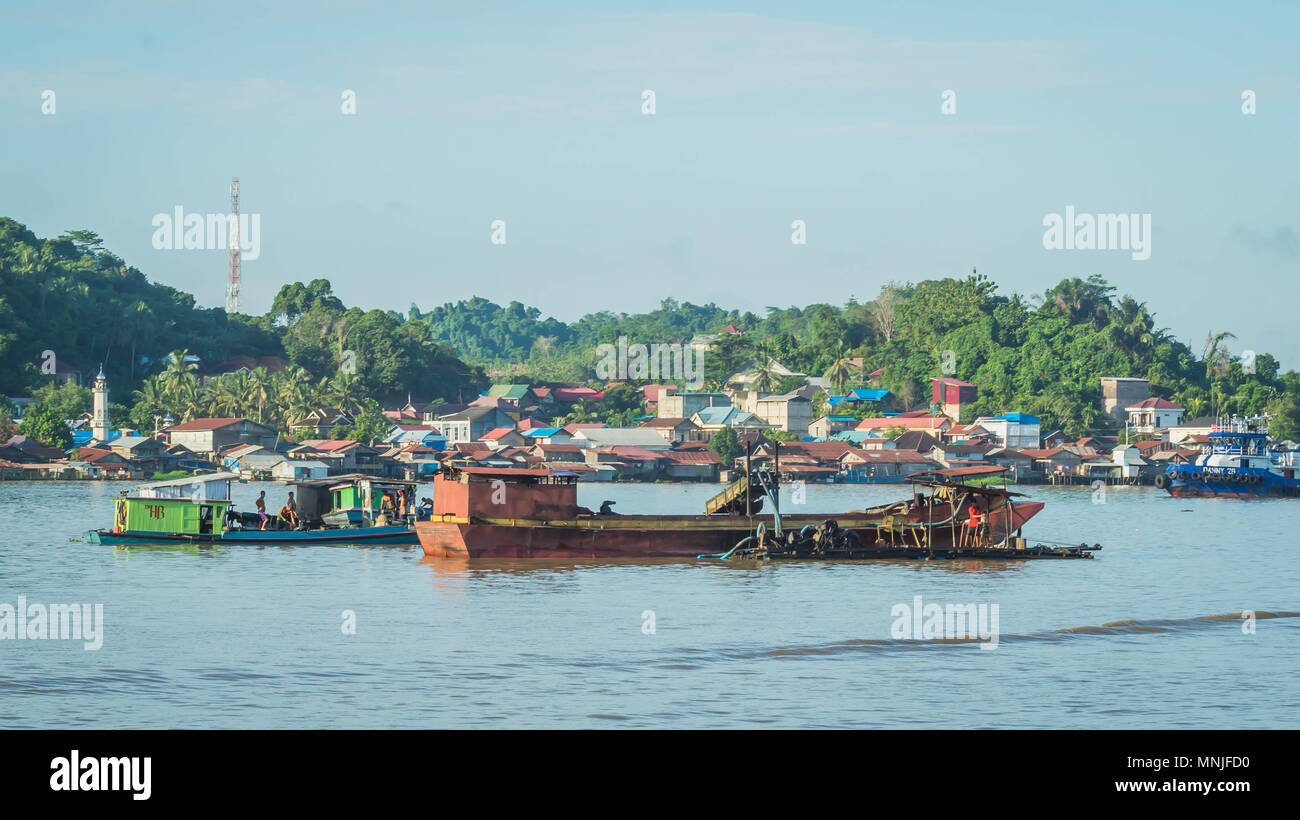 sand mining boat on Mahakam river, Borneo, Indonesia Stock Photo - Alamy