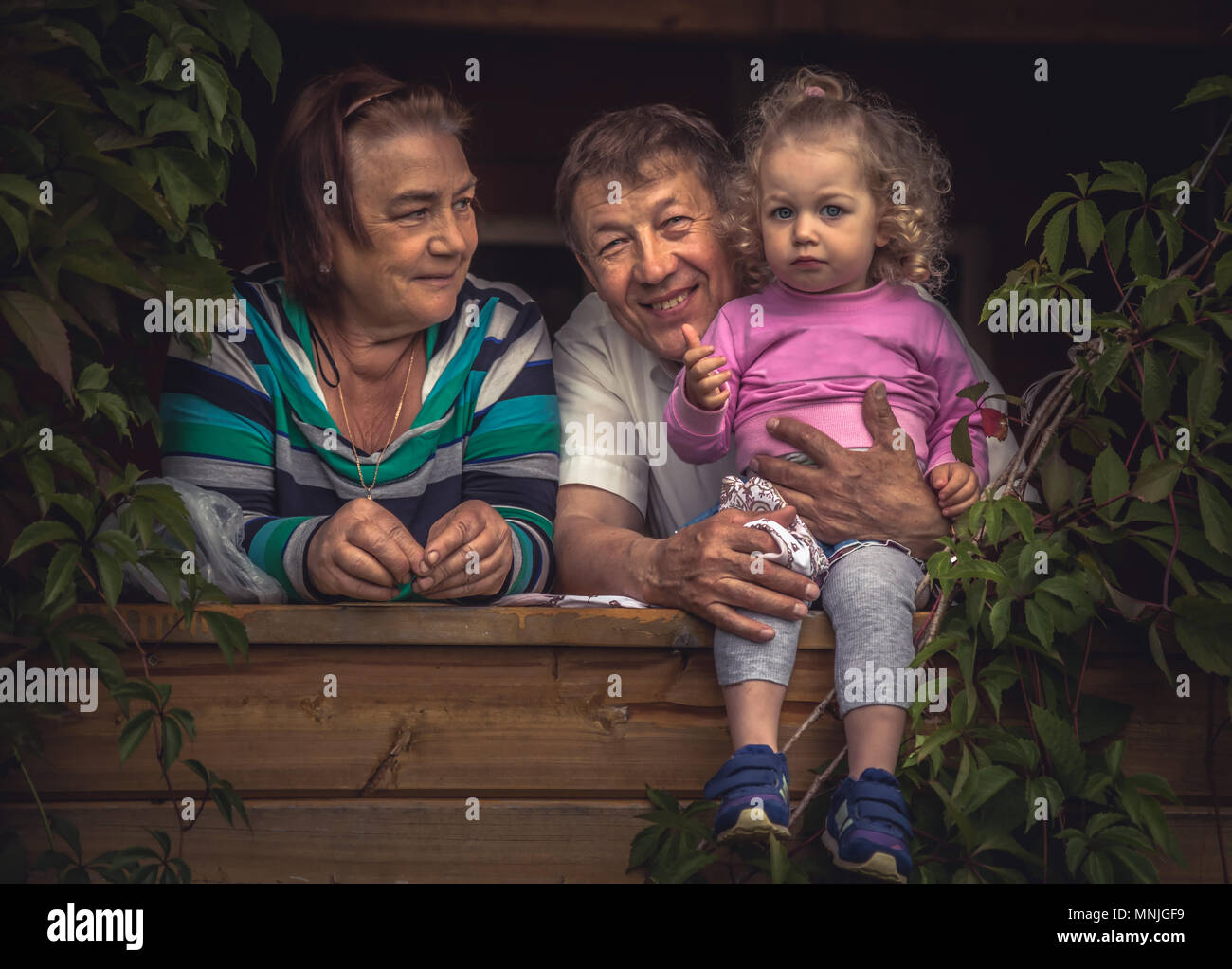 Happy senior grandparents grandchild together potrait happy ...