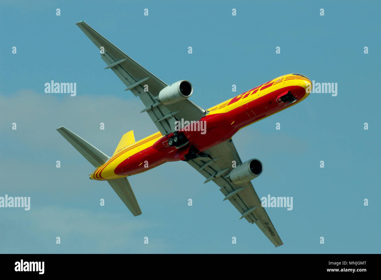 DHL Air Boeing 757 G-BMRD cargo transport jet plane flying at an ...