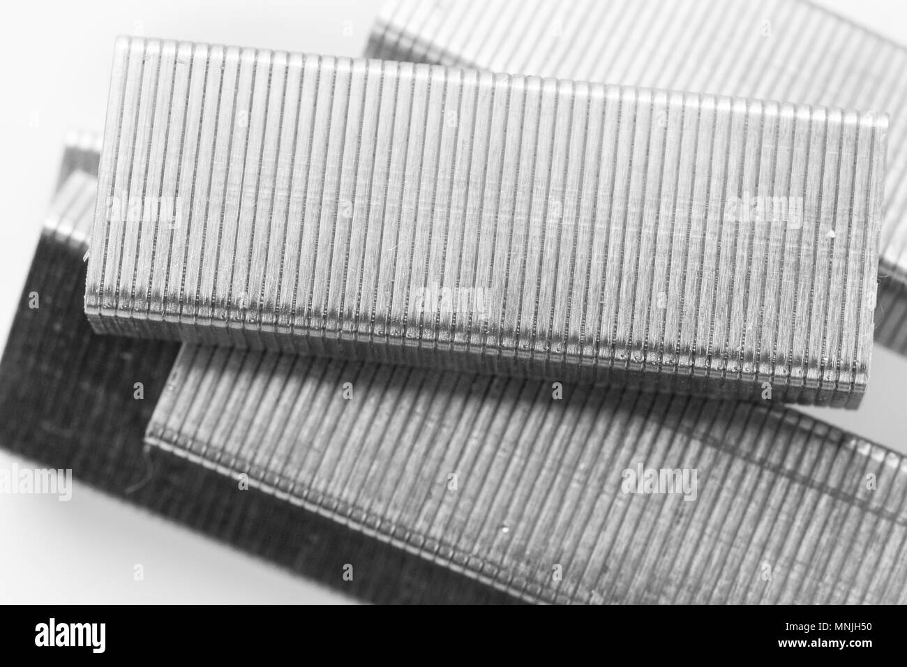 silver staples stacked Stock Photo - Alamy