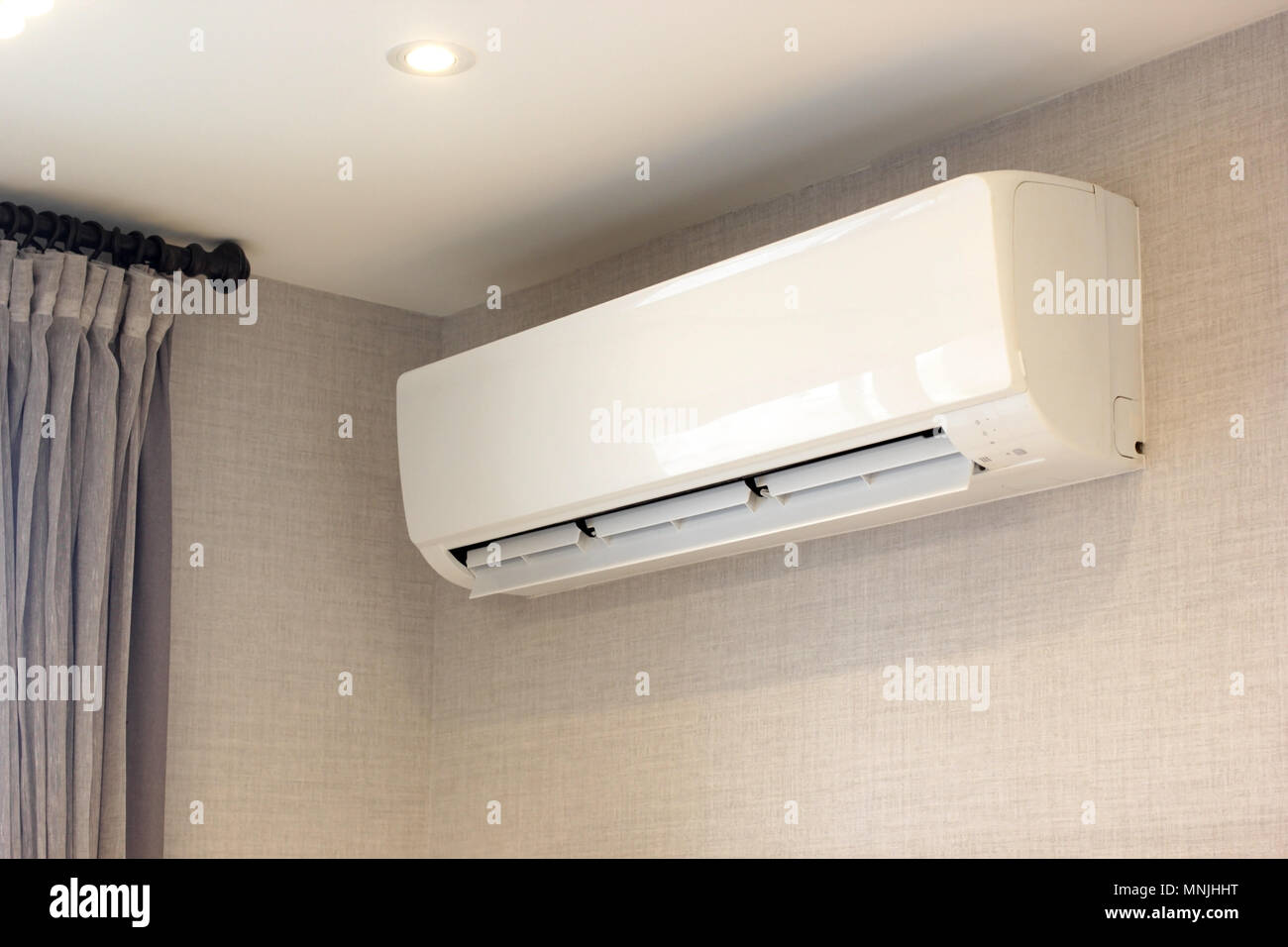 indoor unit of air conditioner, wall type fan coil unit Stock Photo - Alamy