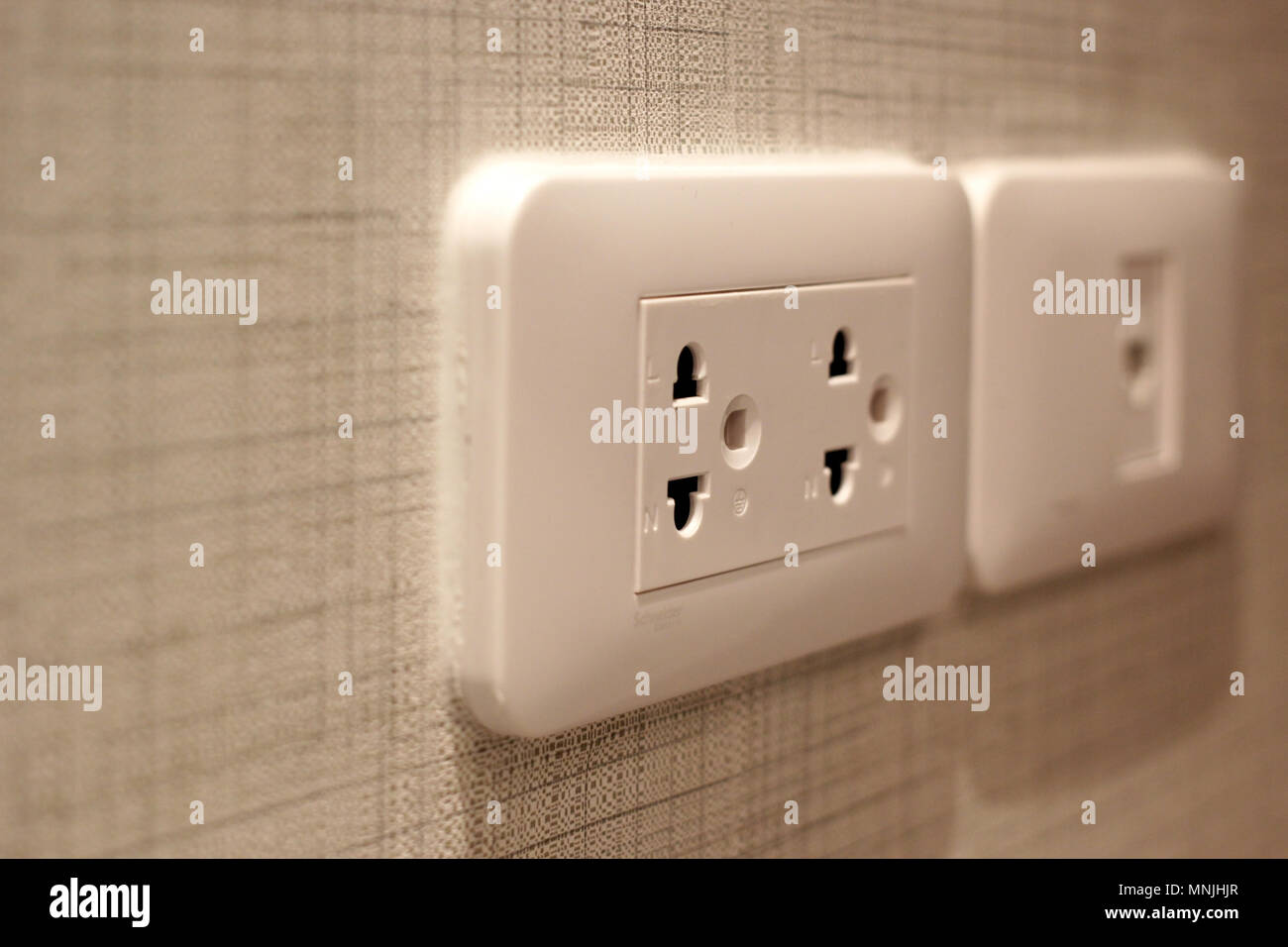 White electrical wall outlet hi-res stock photography and images - Alamy