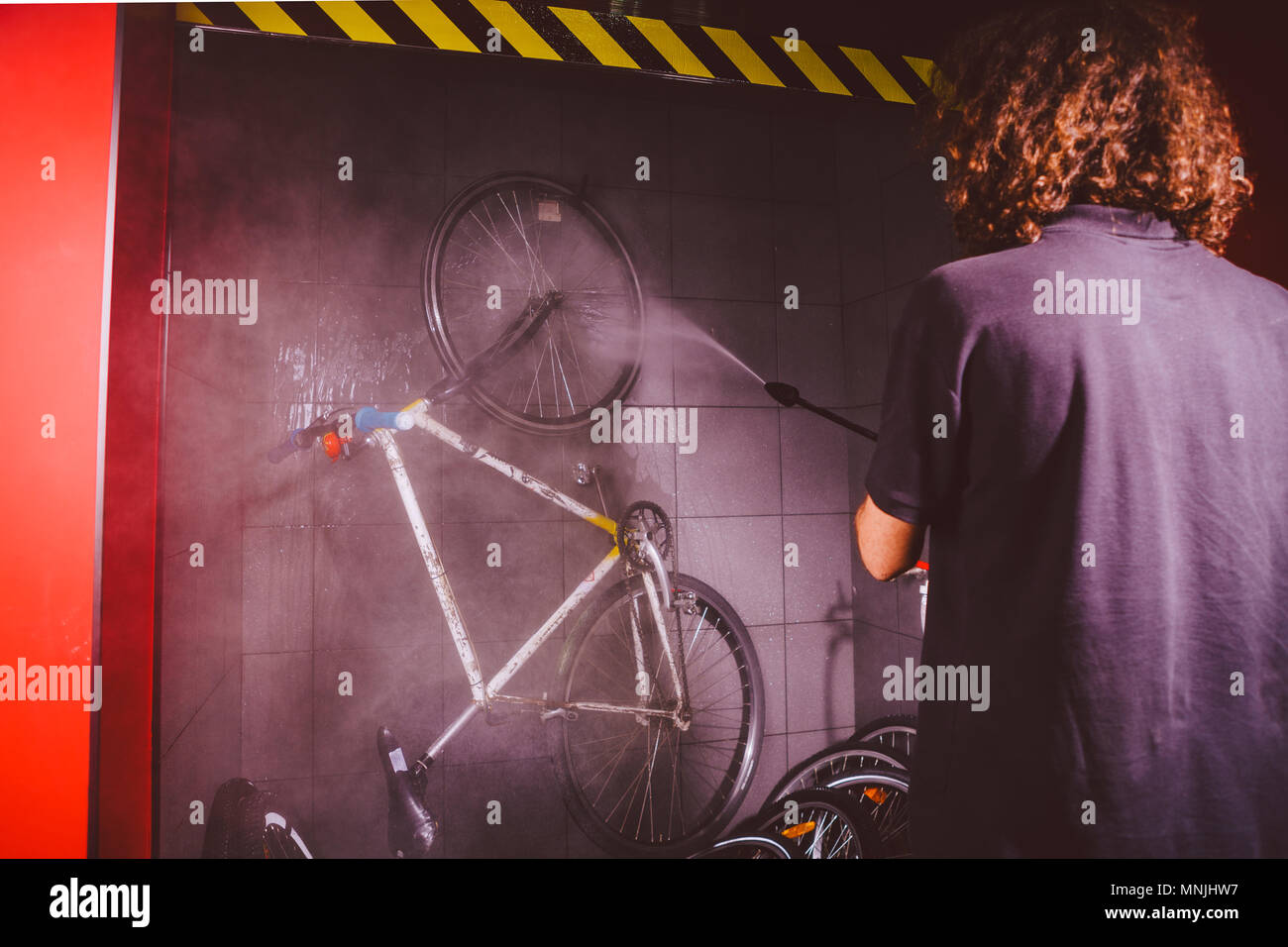 Services professional washing of a bicycle in the workshop. Close-up of ...