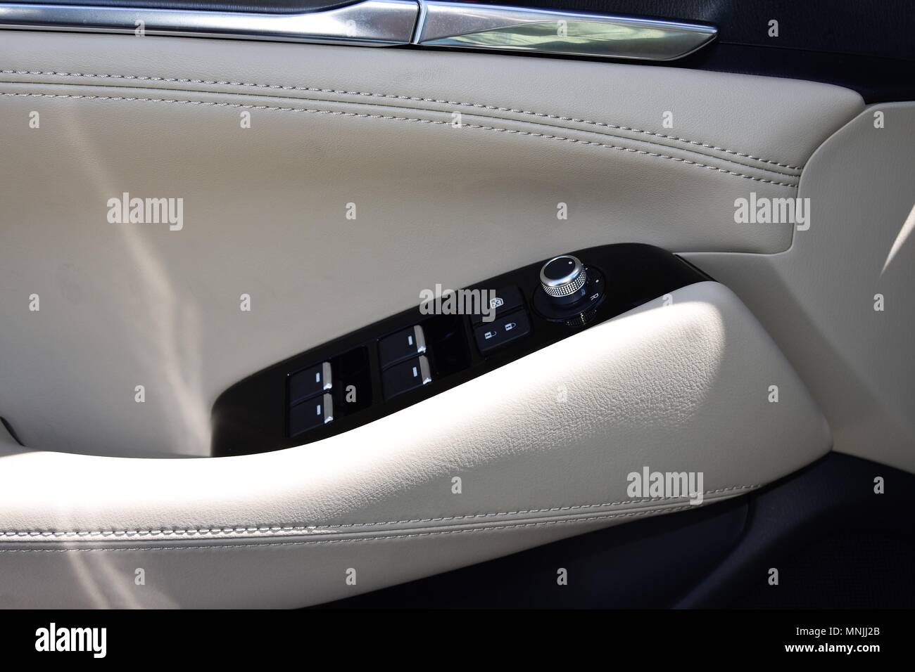 Power window controls on car Stock Photo - Alamy
