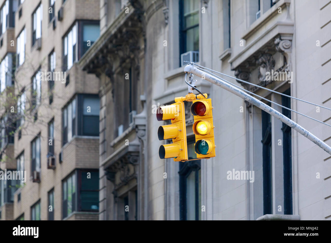 New York yellow traffic light at Museum mile Stock Photo - Alamy