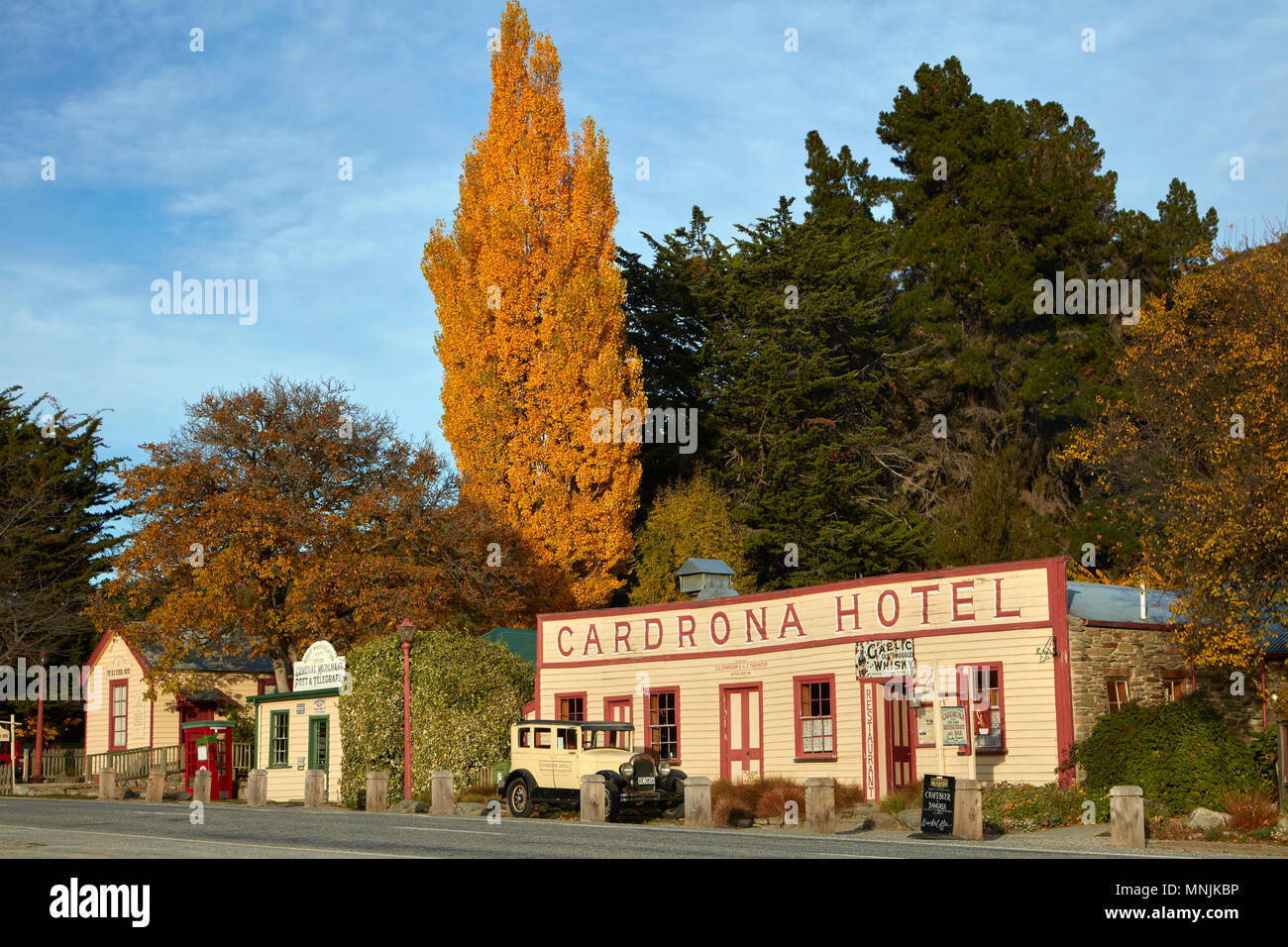 Historic Cardrona Hotel and vintage car, near Wanaka, South Island, New ...
