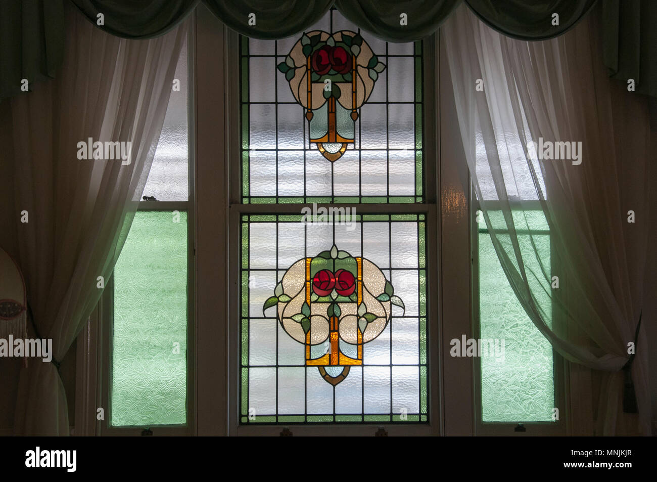 Decorative leadlight glass motifs in an inner-city Art Nouveau ...