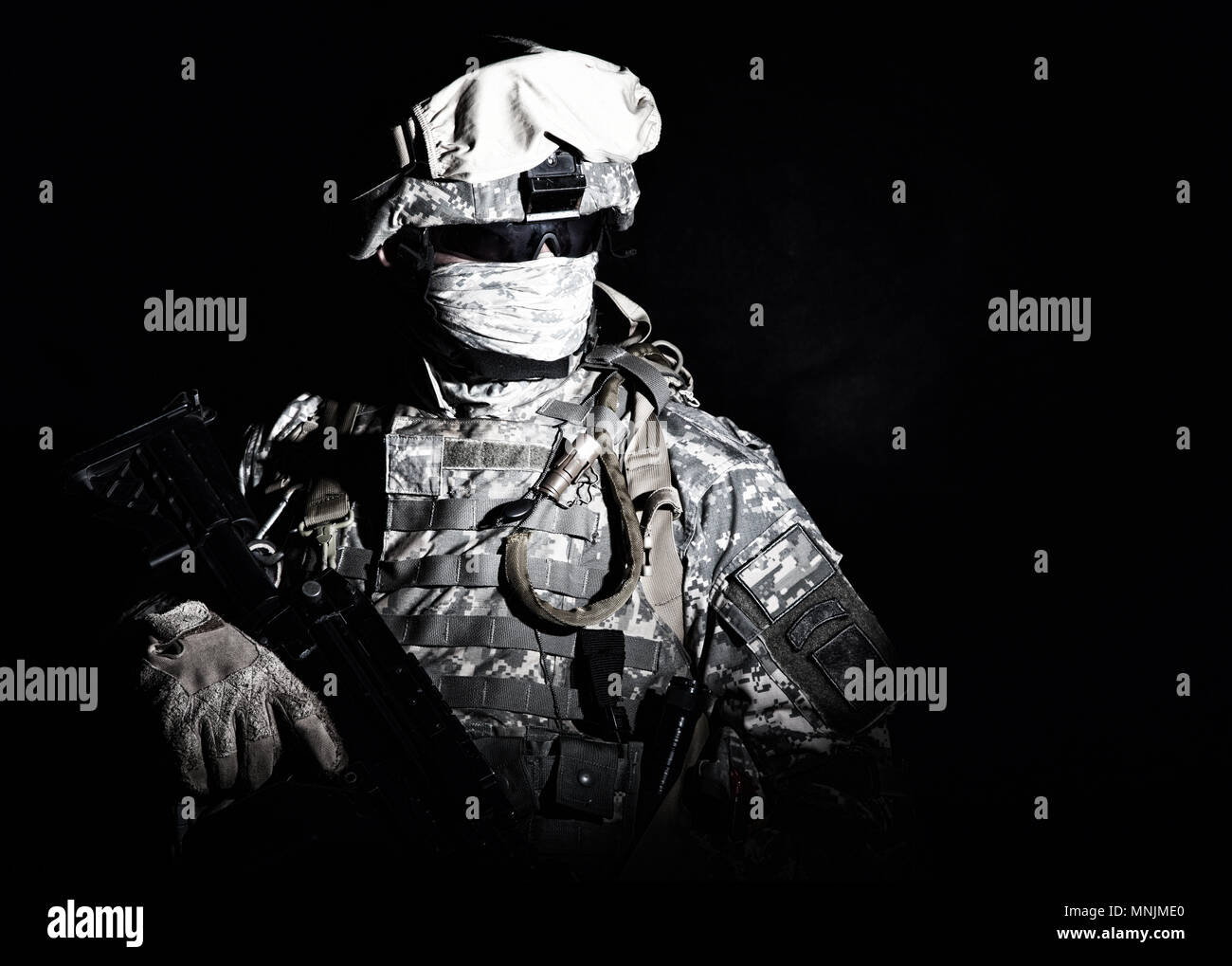 Special forces soldier in projector dazzling light Stock Photo - Alamy