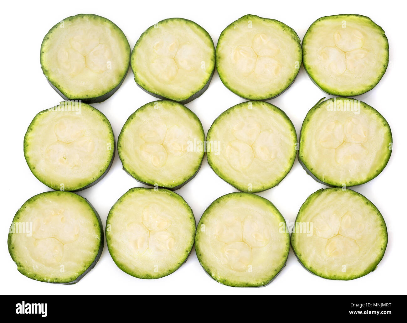 fresh zucchini in front of white background Stock Photo - Alamy