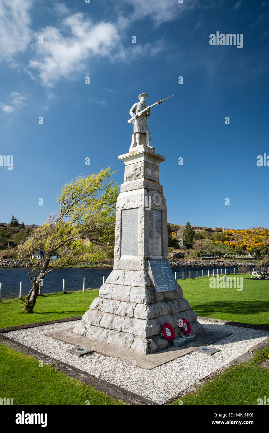 War memorial sculpture on the waterfront of Loch Inver in the northwest ...