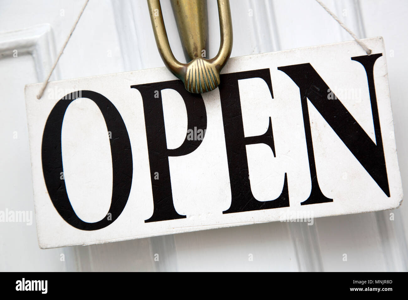 White Open Sign on Shop Door Stock Photo - Alamy