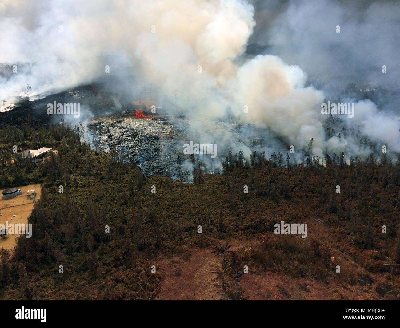 Aerial view of lava flowing and poison gases fissures in Leilani ...