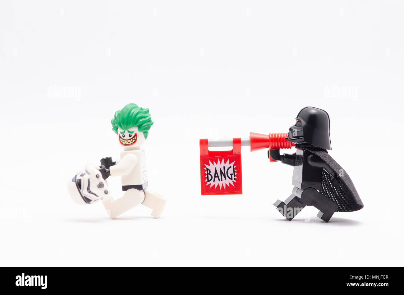 mini figure of darth vader with bang gun aiming shot to joker in storm ...