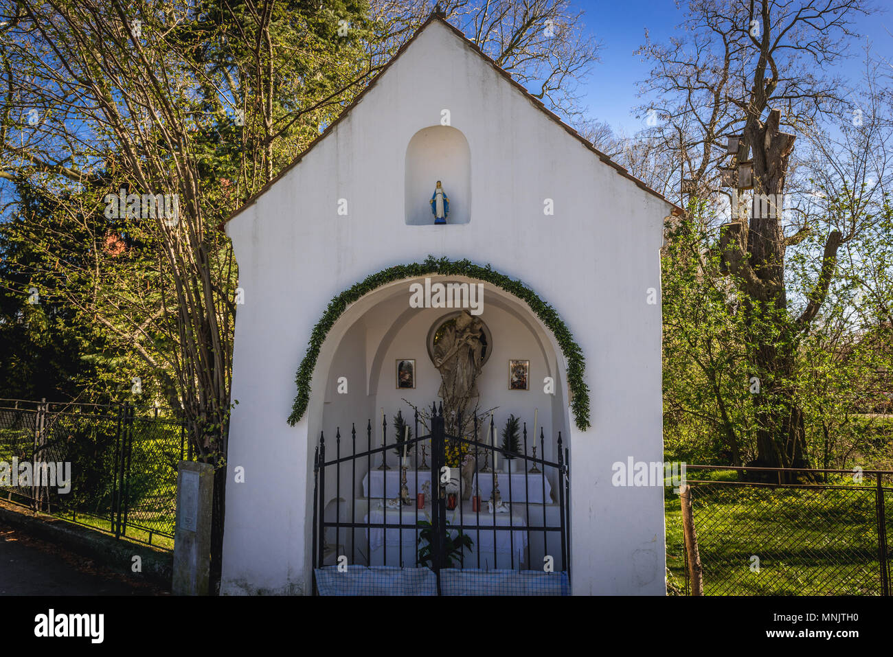 Shrine next to Schloss Orth castle in Orth an der Donau town in ...
