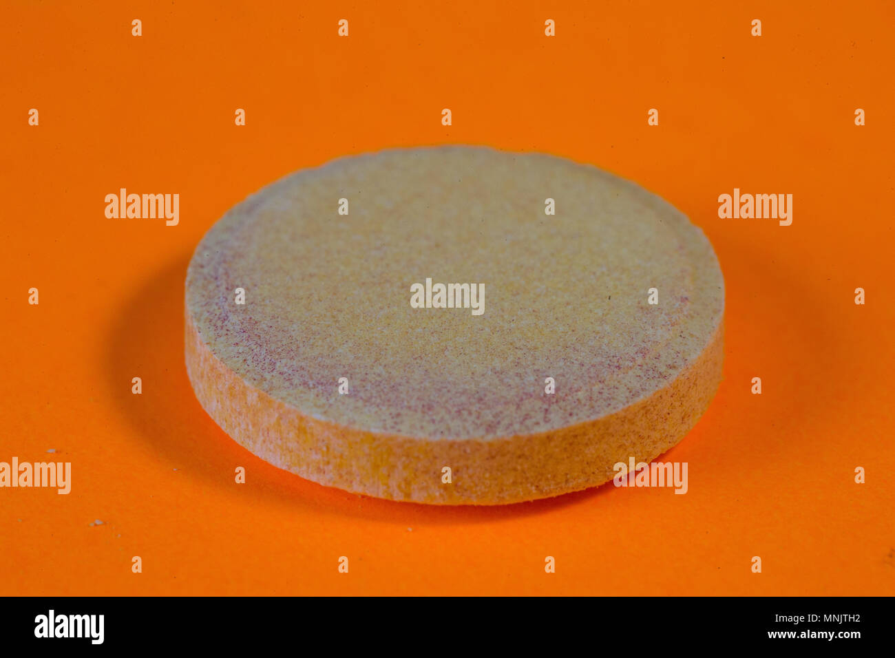 Effervescent vitamin C and Zinc orange flavour tablet Stock Photo - Alamy