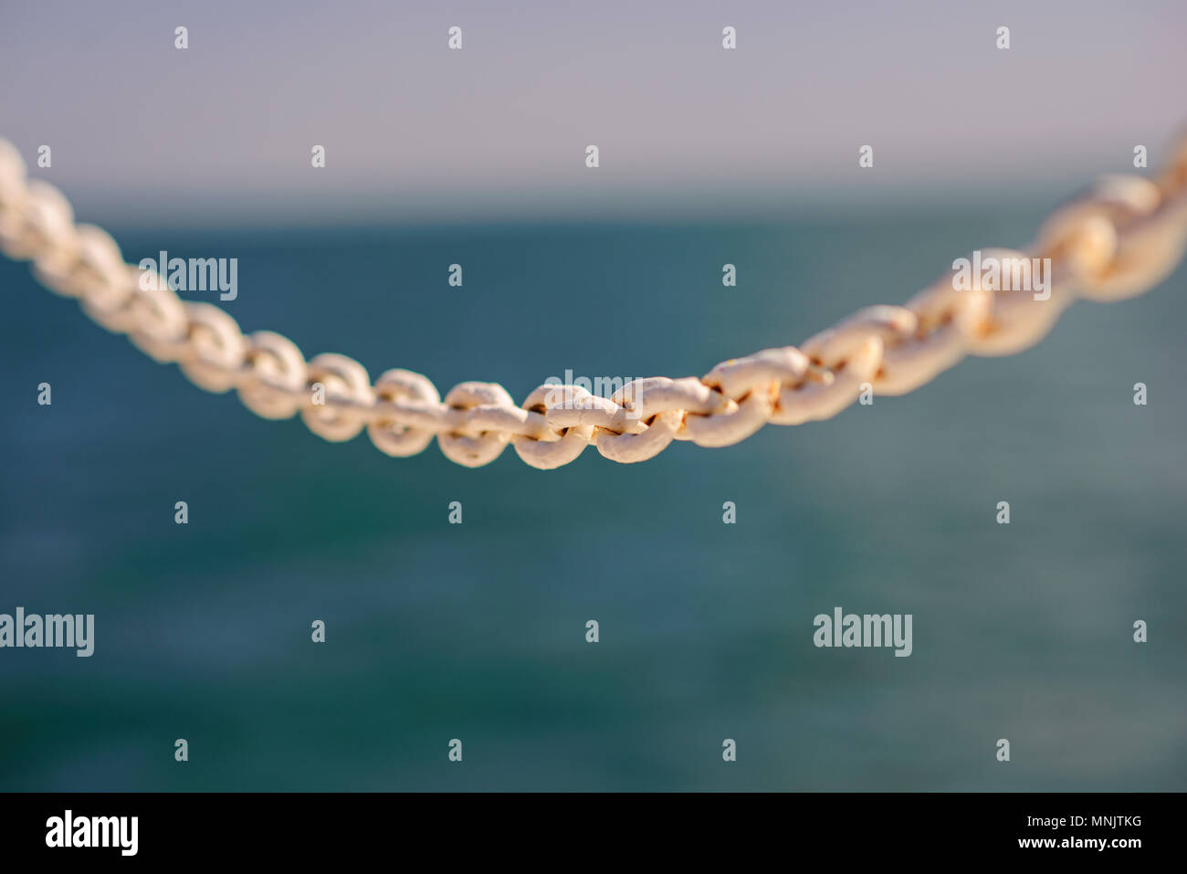 white chain on a liner in the sea Stock Photo - Alamy