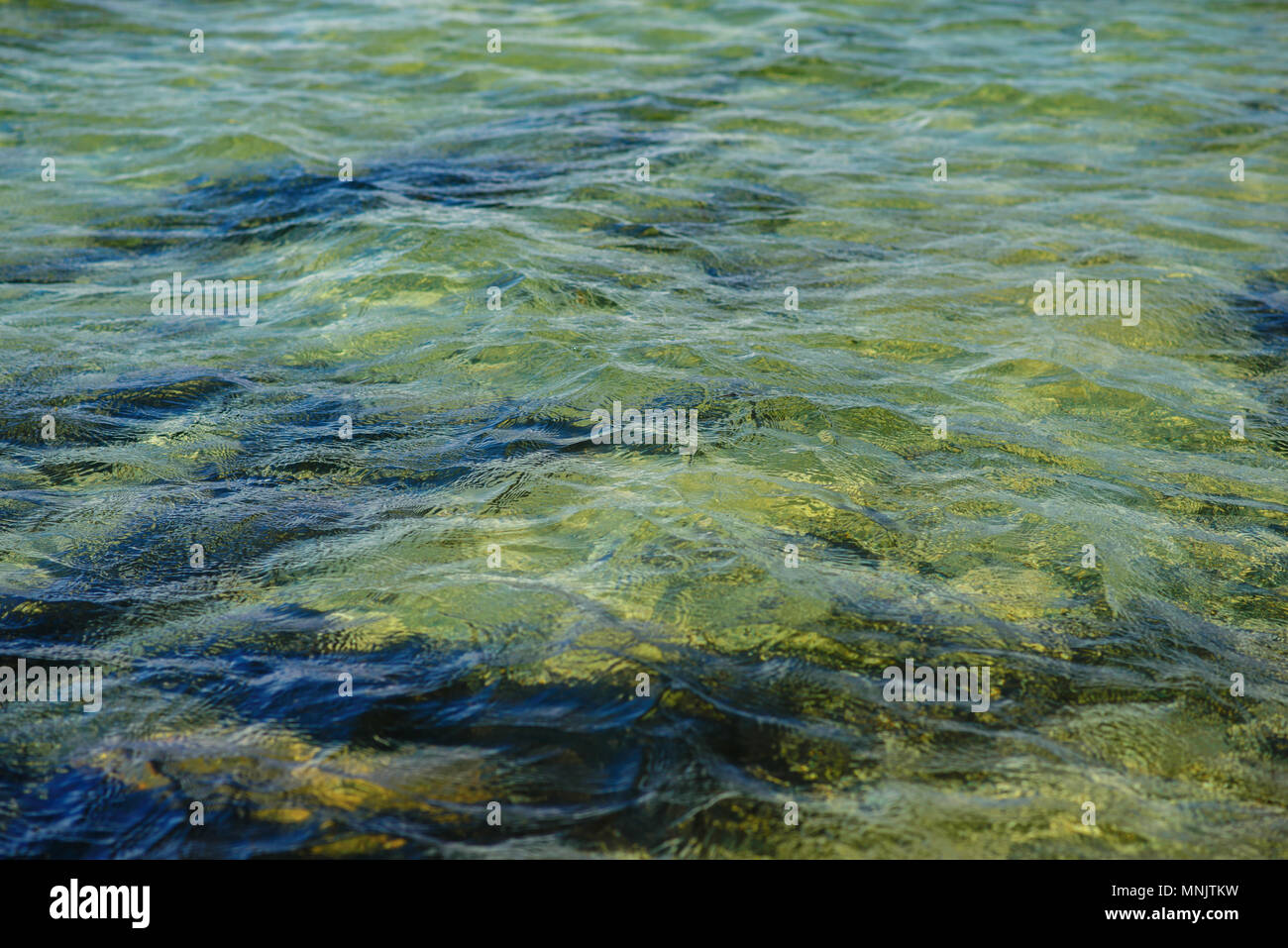 the blue ocean with dull clouds on a lovely sunny day Stock Photo - Alamy