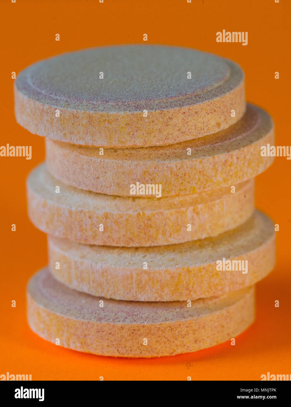 Effervescent vitamin C and Zinc orange flavour tablets Stock Photo - Alamy