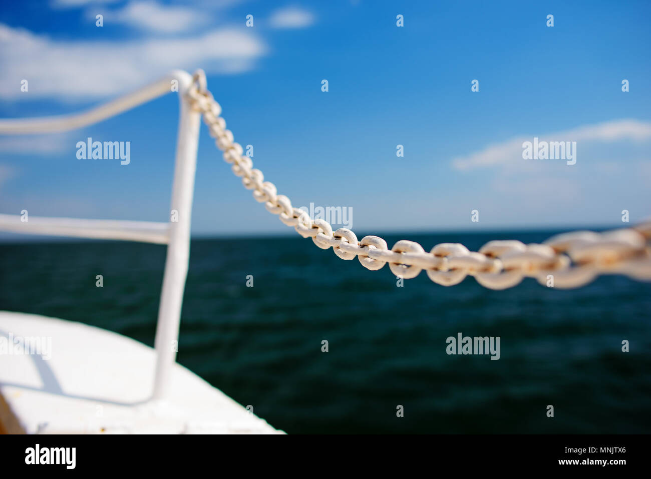 white chain on a liner in the sea Stock Photo - Alamy