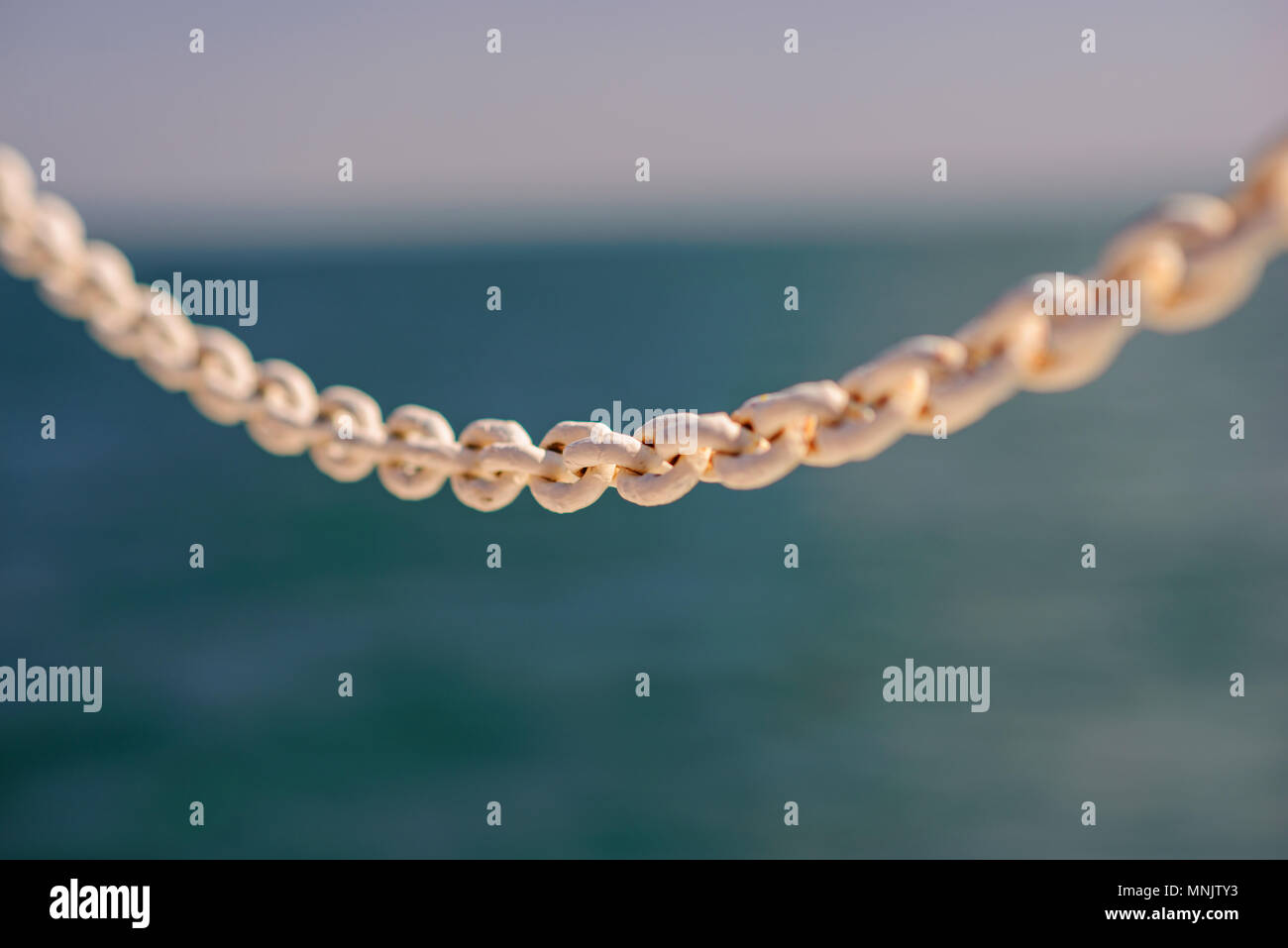 white chain on a liner in the sea Stock Photo - Alamy