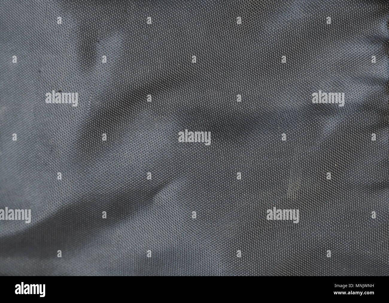 black synthetic fabric bag texture Stock Photo - Alamy