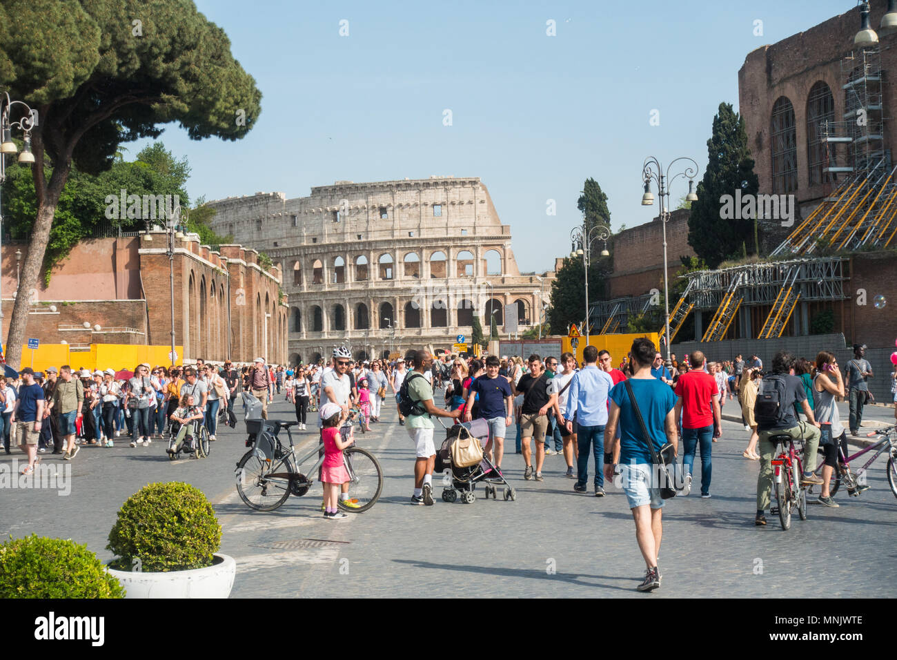 Rome Italy People enjoying a sunny day next to Colosseum in Via dei ...
