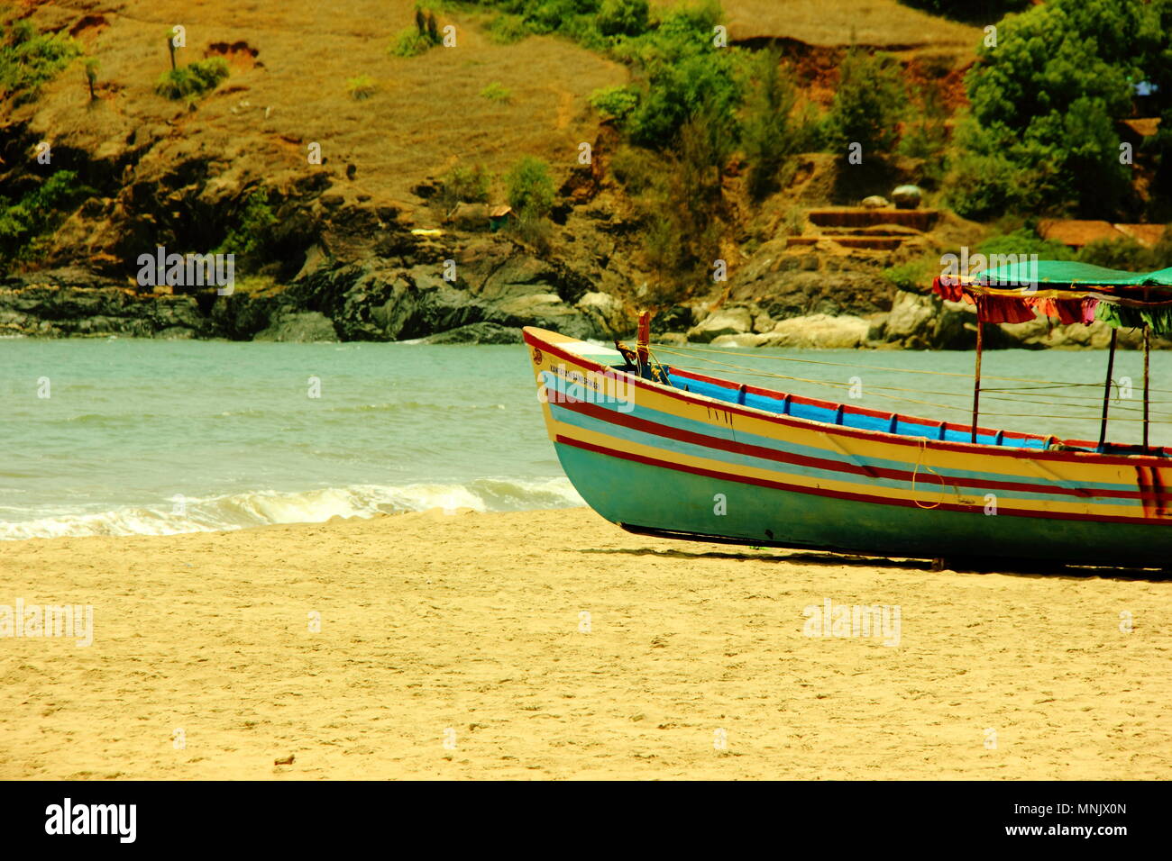 A fishing boat at coast in Goa, India Stock Photo - Alamy