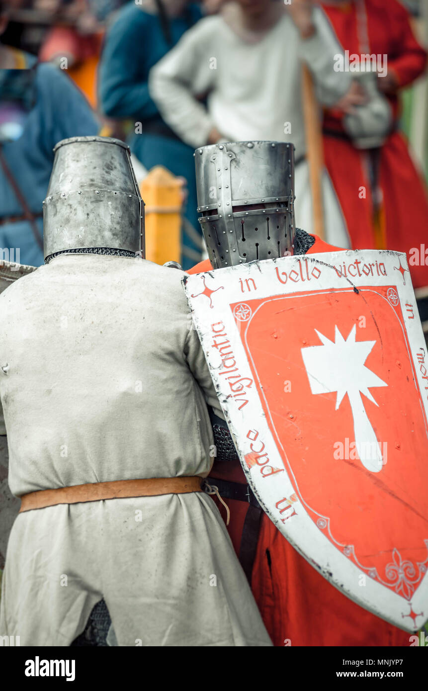 Two people clash swords in hi-res stock photography and images - Alamy