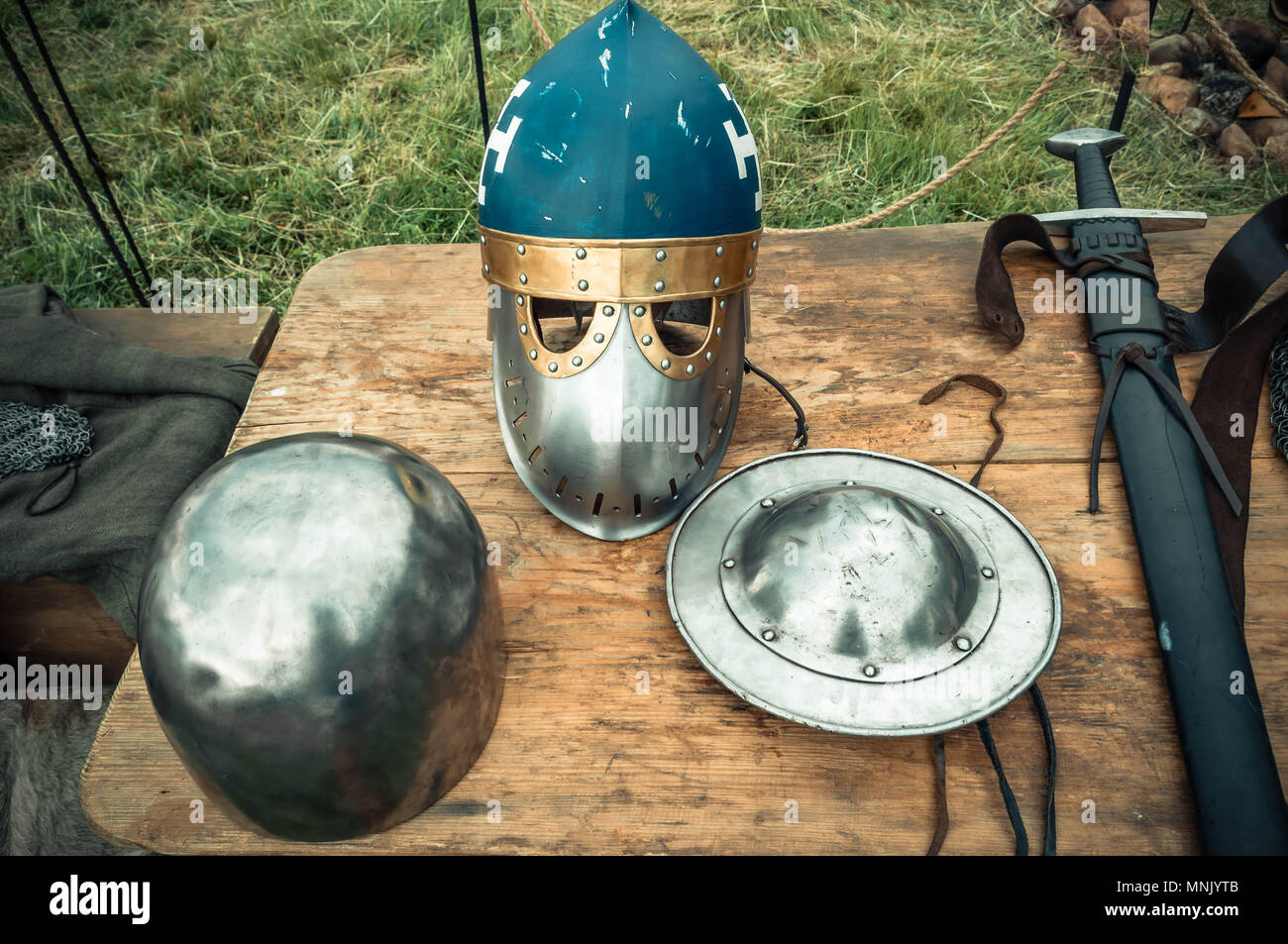 Medieval scene. Medieval knight attributes are helmet, chain mail ...