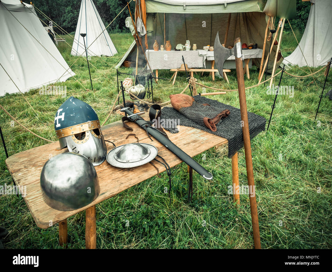Medieval scene. Medieval knight attributes are helmet, chain mail ...