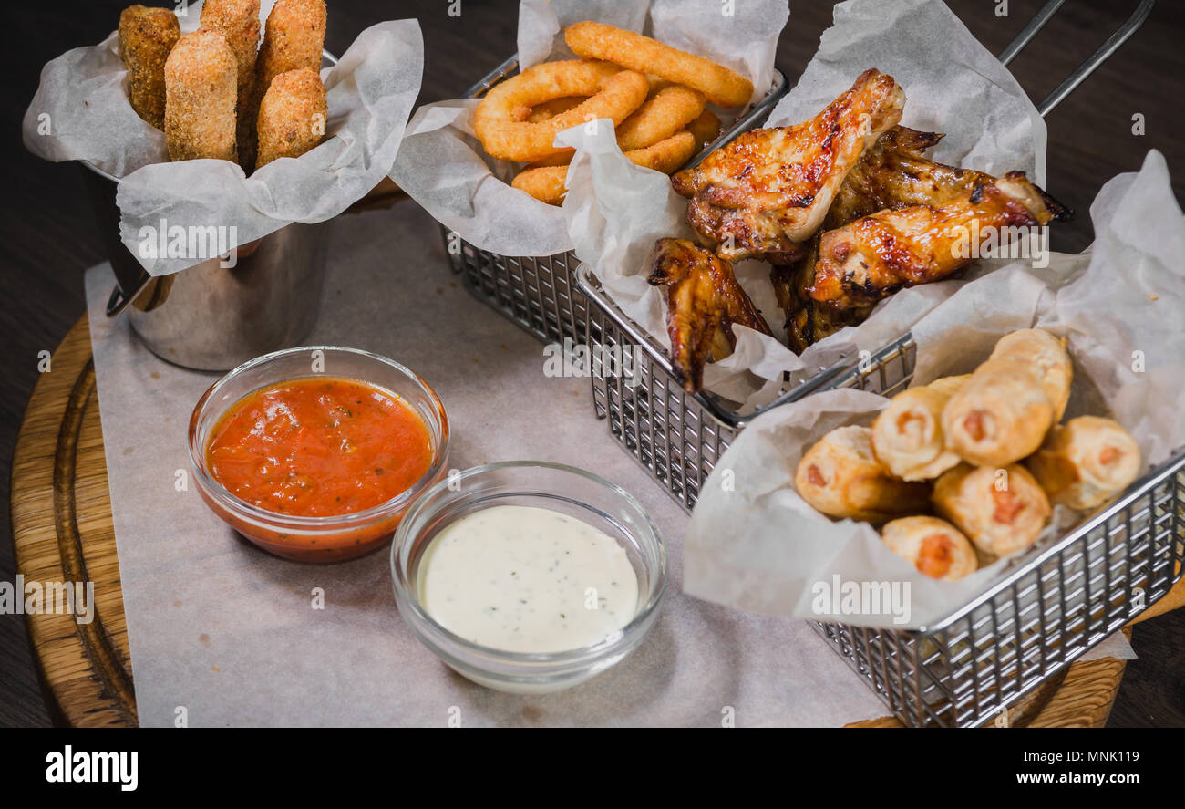 Snack for beer in the form of nuggets cheese rings and fried chicken ...