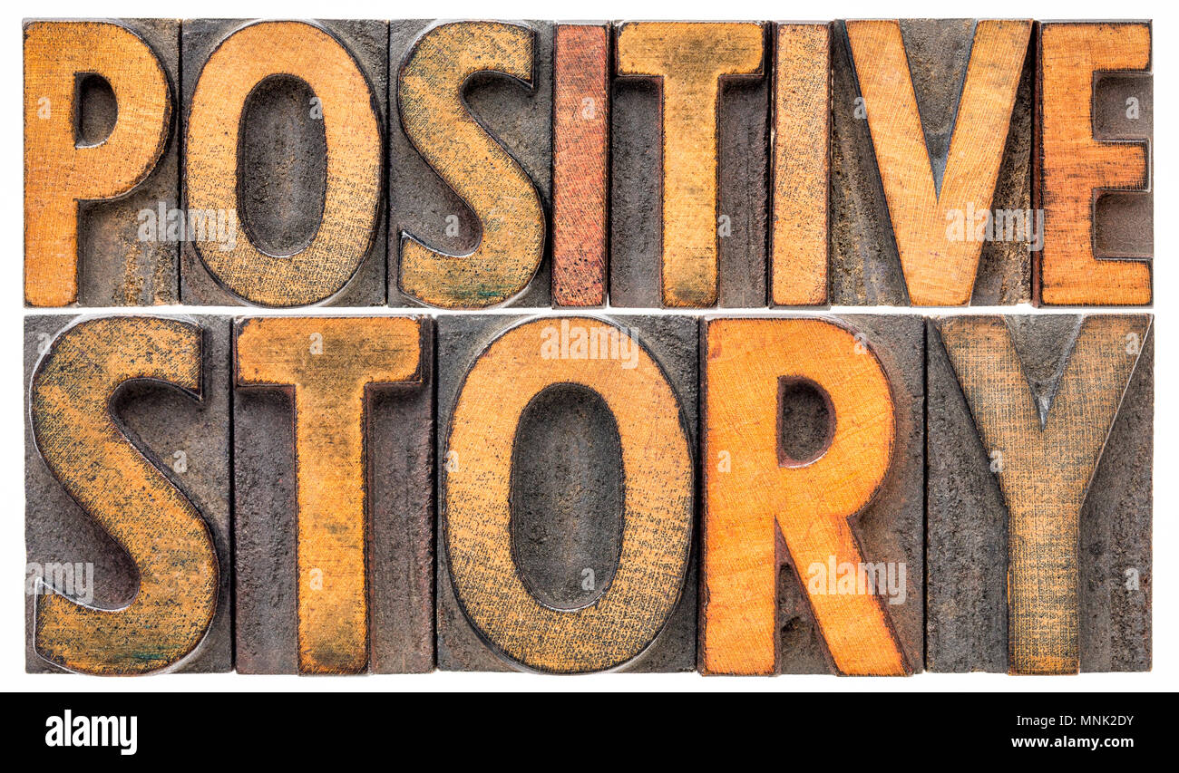 positive story - isolated word abstract in vintage letterpres wood type ...