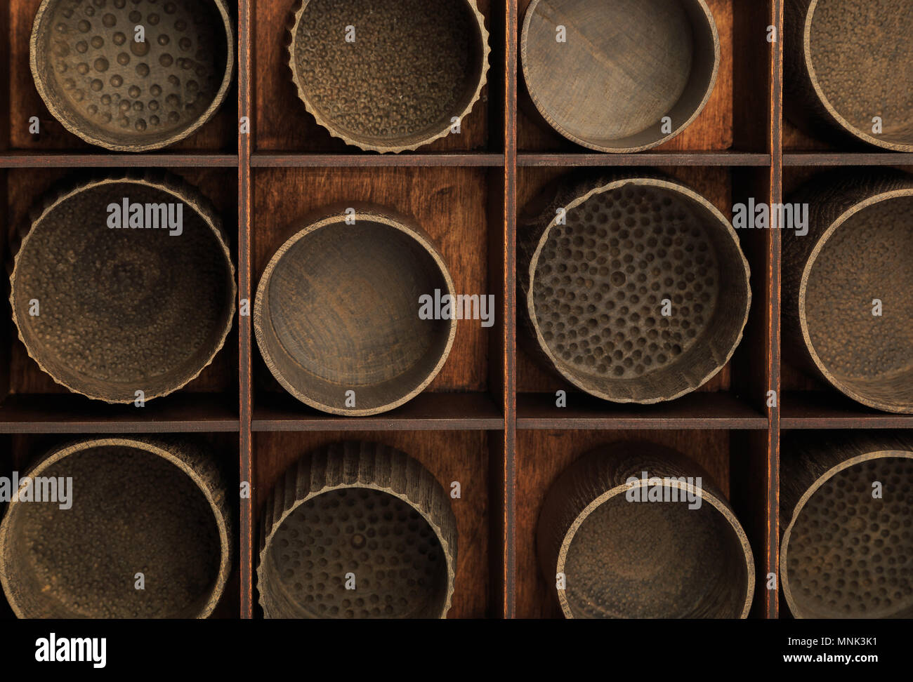 Wooden cups in a box for storing dishes Stock Photo - Alamy