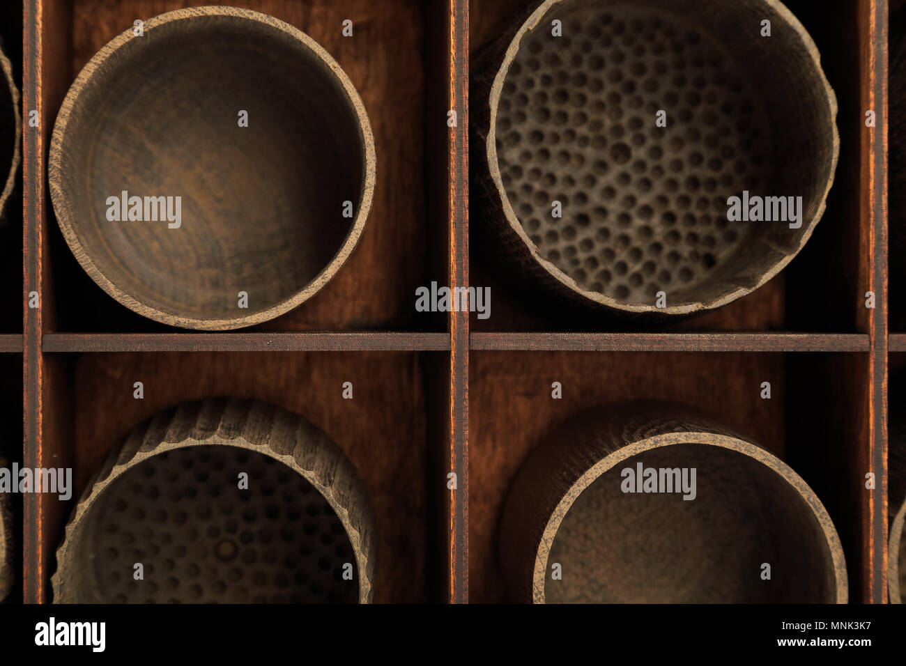 Wooden cups in a box for storing dishes Stock Photo - Alamy