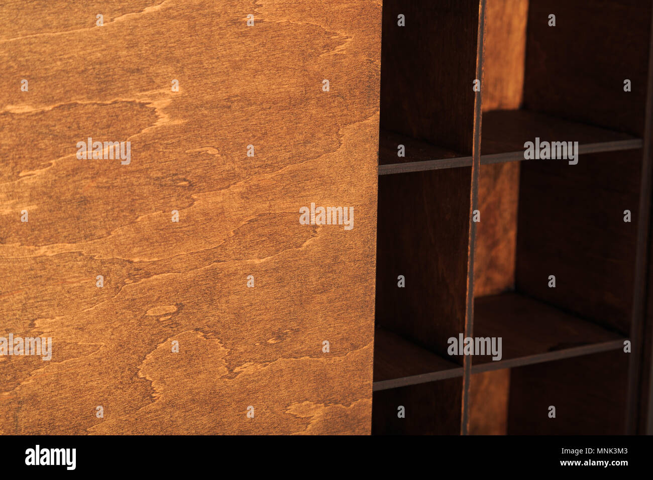 Wooden box for storing utensils with cells Stock Photo - Alamy